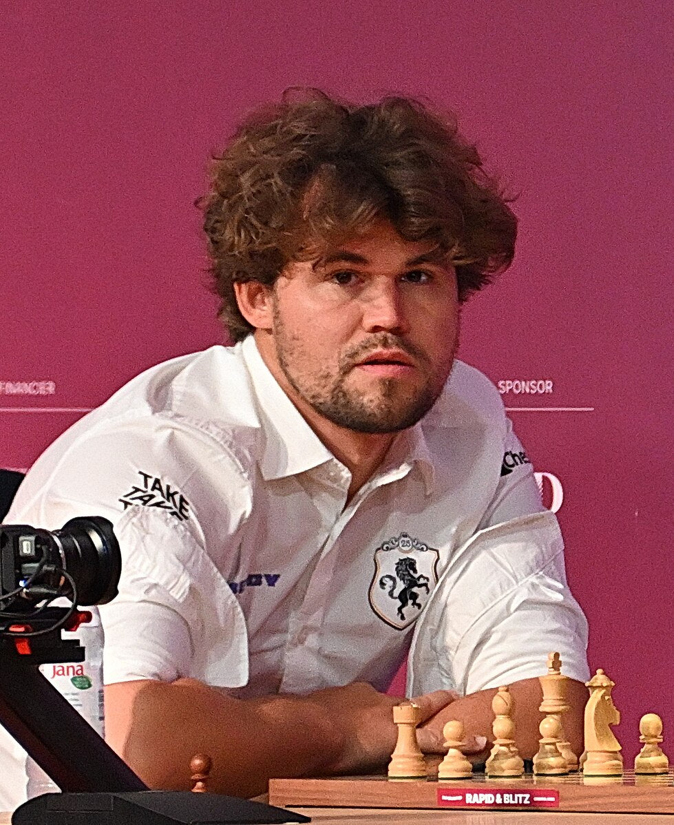 The King Retains His Crown: Magnus Carlsen Does the Double in Doha ...